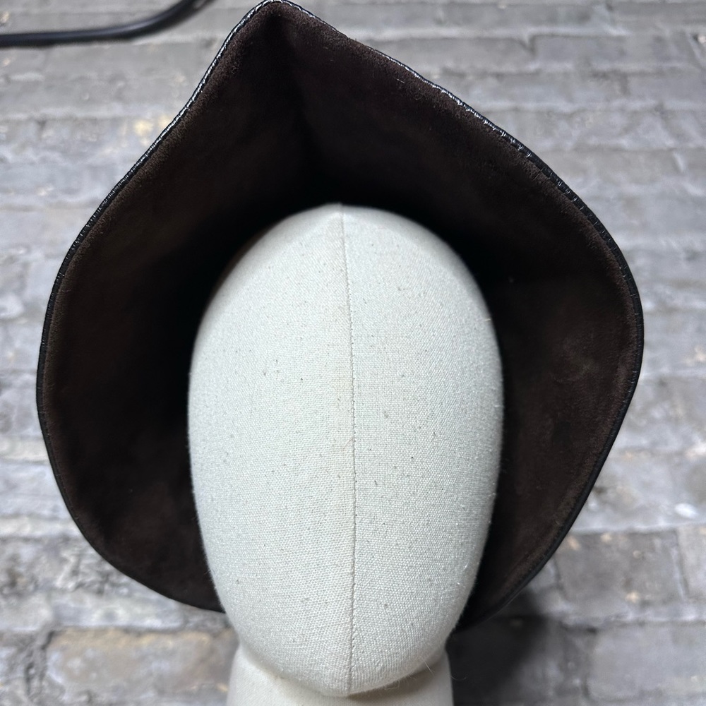 Vintage. “The Seasoned Traveler” Leather Bonnet - Gem